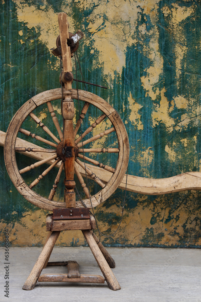 Old spindle. Old wooden spinning-wheel distaff. Spinning Wheel. Stock ...