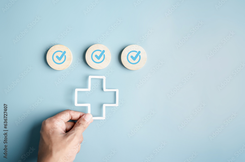 Health Care Checkup Concept. people hands holding plus symbol with ...