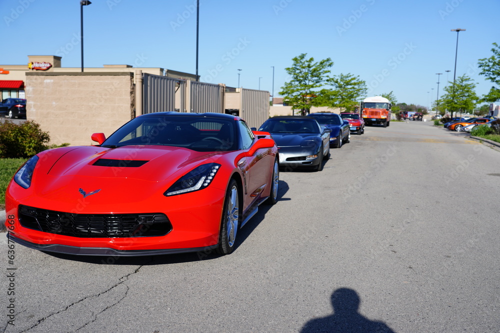 2011 Red Chevy Corvette lined up in front with other Chevy Corvette ...