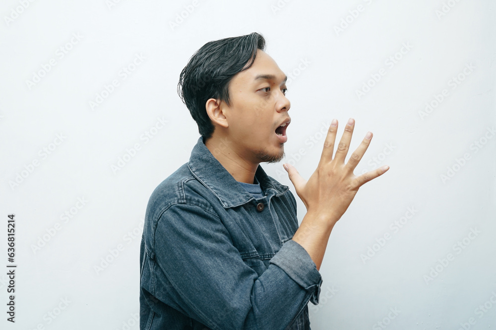 Portrait of Indonesian Asian man showing mother sign language for ...