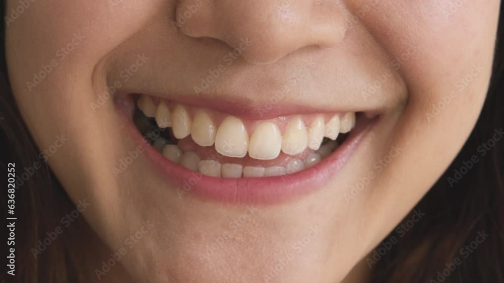 Close-up lips lower facial of young teen girl asia Gen Z people smile ...