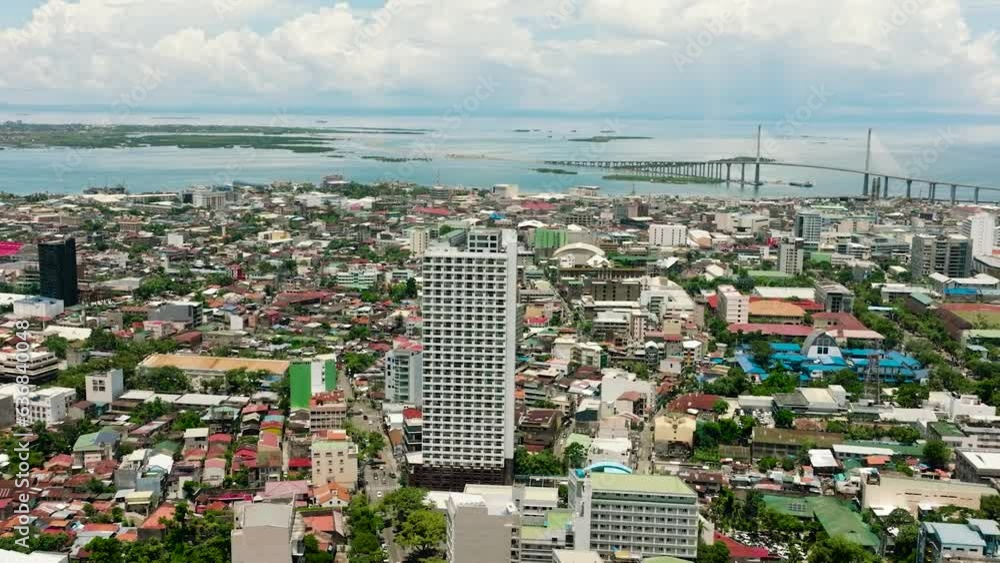 Panorama of Cebu city with tall buildings. Cebu Cordova Link Expressway ...