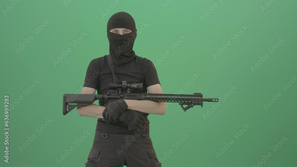 Pack shot Army strike man posing with machine gun over green screen 4K ...
