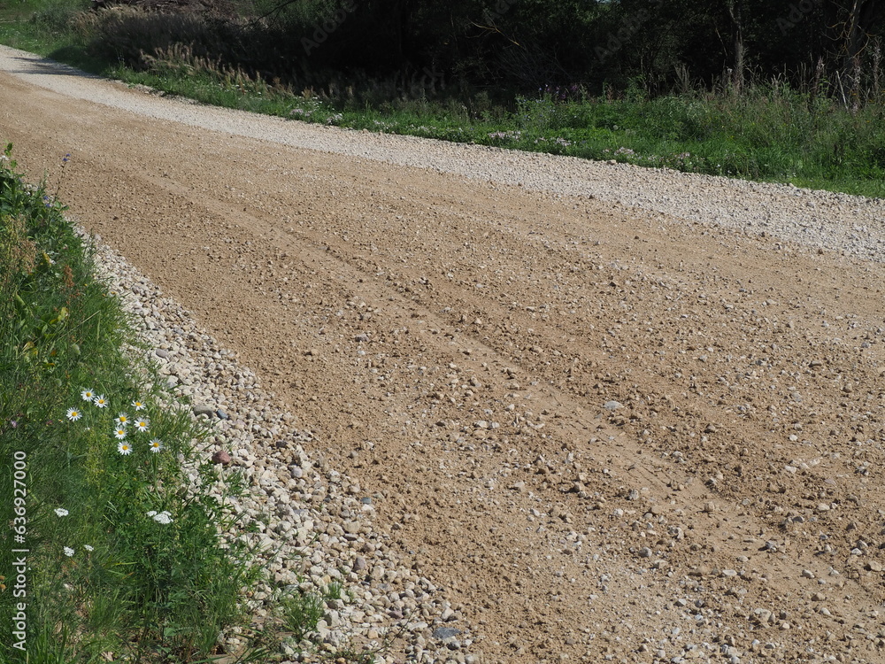 Graded gravel road. Maintenance of dirt and gravel roads. Rural ...