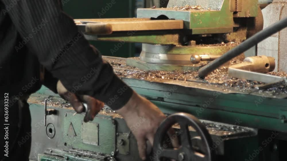 Tilt around the green colour lathe machine. Head of the machine is ...