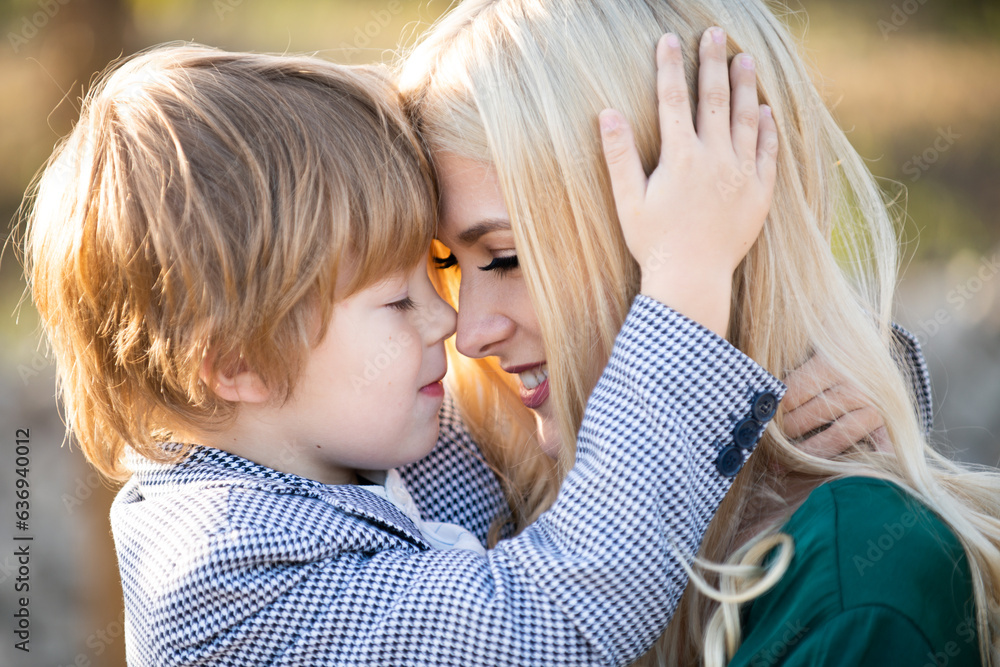 Mother hug. Portrait of mother and child hugging. Mother hugging and embracing son. Mothers day ...