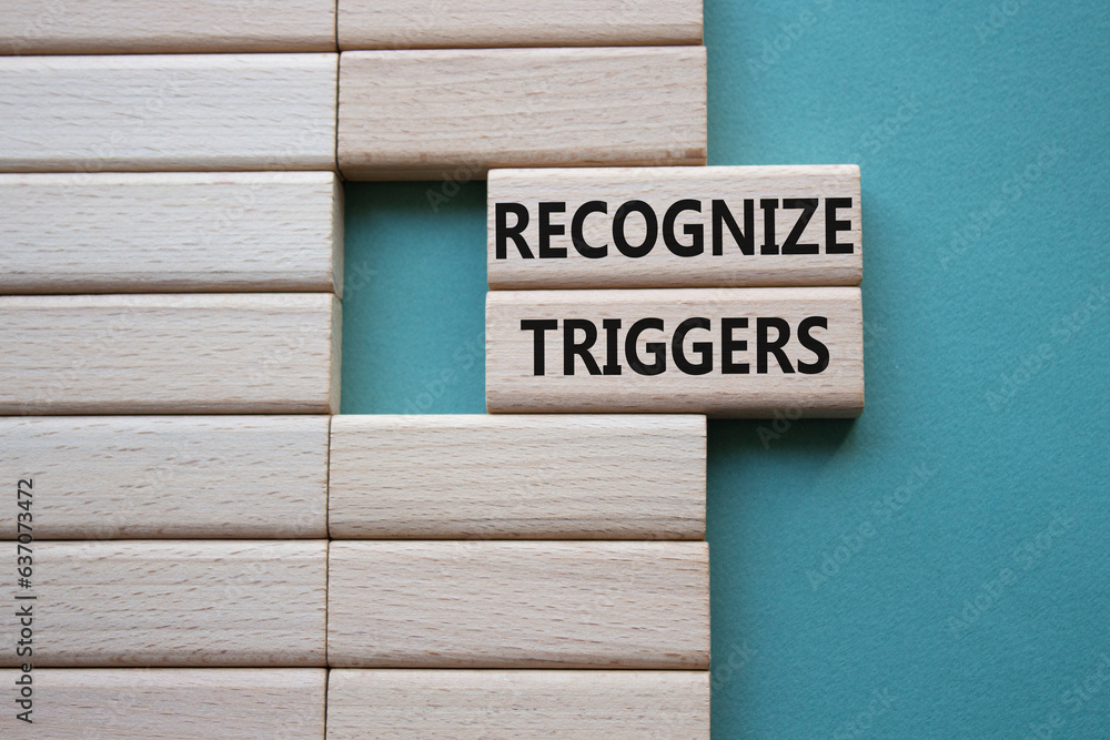 Recognize triggers symbol. Concept words Recognize triggers on wooden ...