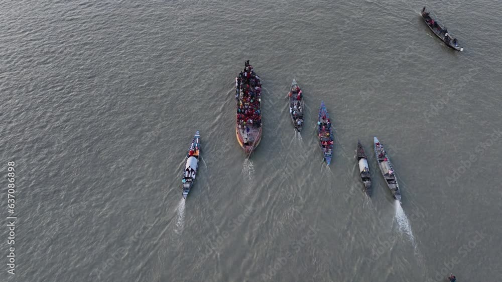 The aerial shot of boats crossing the Jamuna River in Bangladesh is a ...