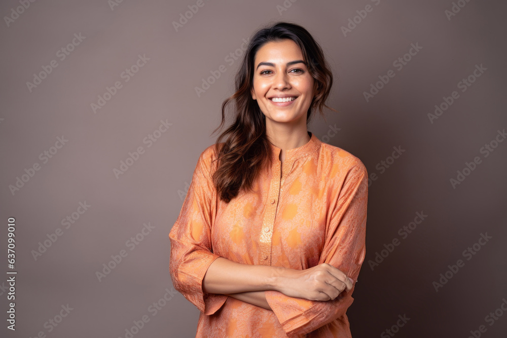 Group portrait of an Indian woman in her 30s wearing kurta pajama in a ...
