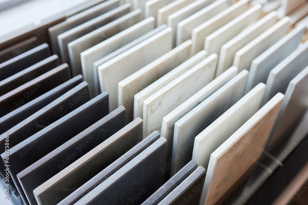 Exposition of ceramics in a showroom new tiling option for floors and ...