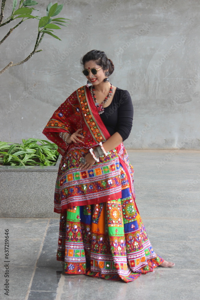 beautiful indian woman wearing red and black chaniya choli with ...