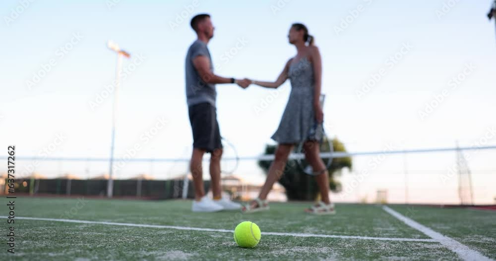 Handshake on tennis court respect partner closeup. Playing tennis and ...