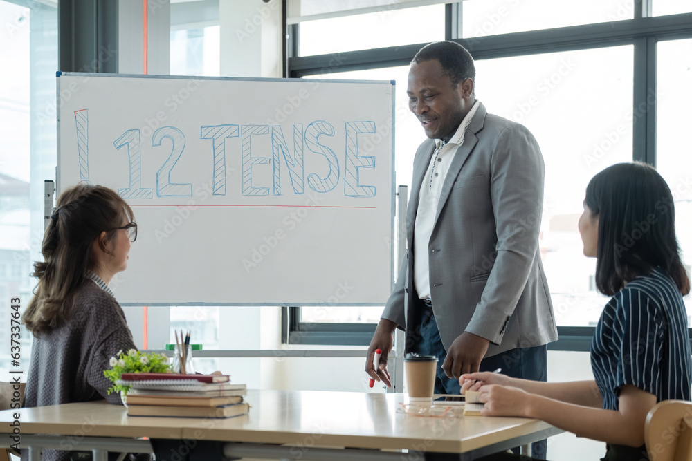 Positive friendly African American English tutor giving language ...