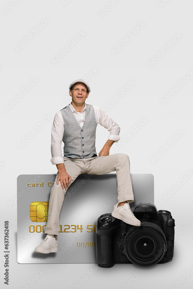 Young professional photographer working with online payment transaction ...