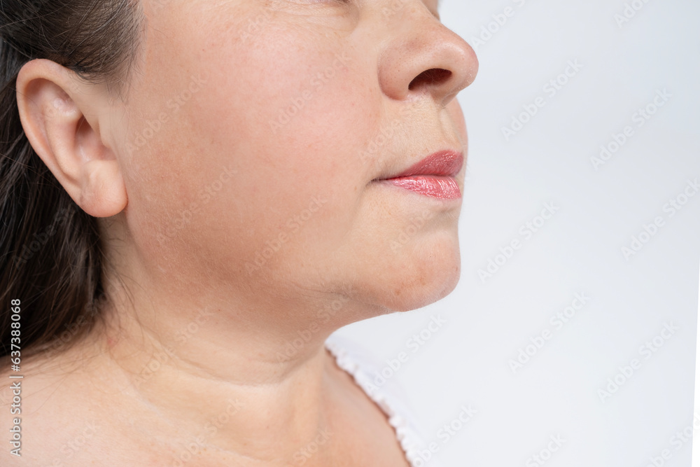 close-up face, adult middle-aged woman 45 years old looking at age ...