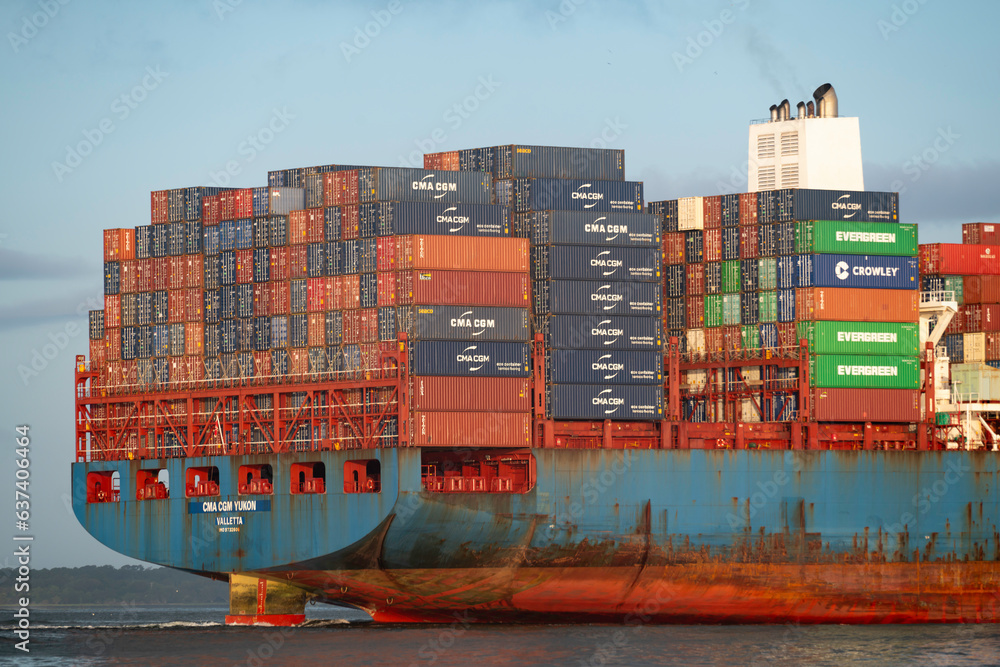The stern of the container ship CMA CGM Yukon, showing stacked shipping ...