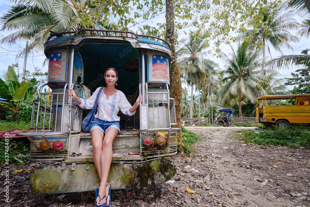 Traveling Asia. Young pretty woman in traditional philippines bus ...