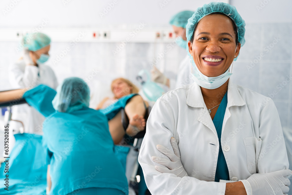 Portrait of successful smiling African American female doctor ...