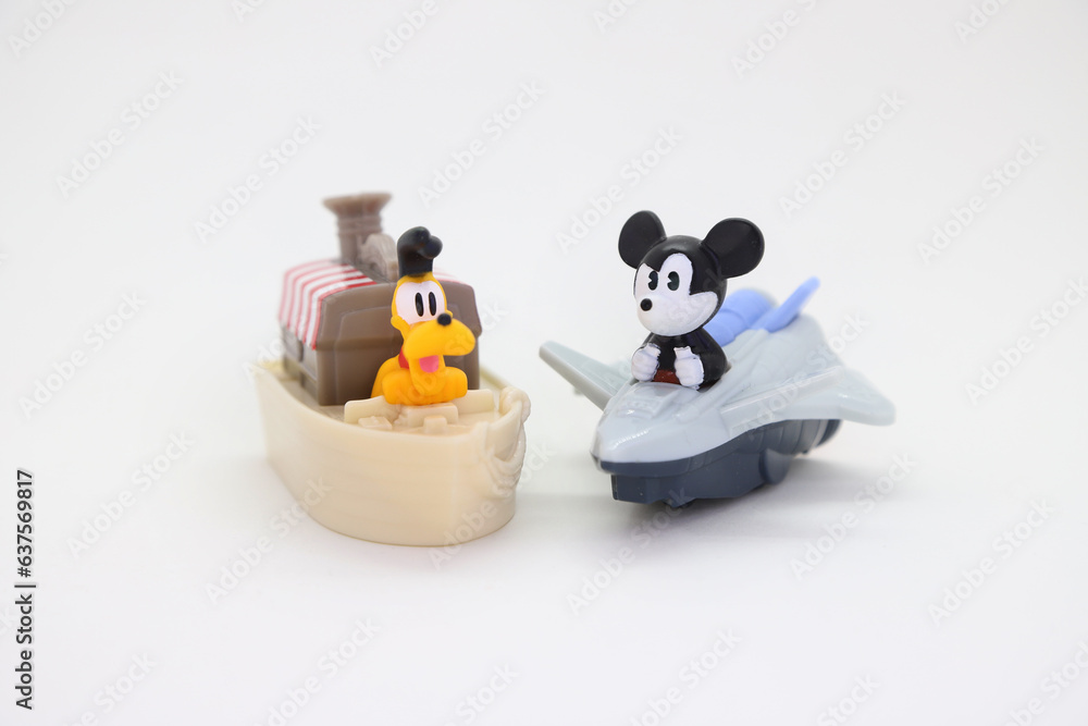 Pluto the dog sailing on a steamboat at the Disney World parks and ...