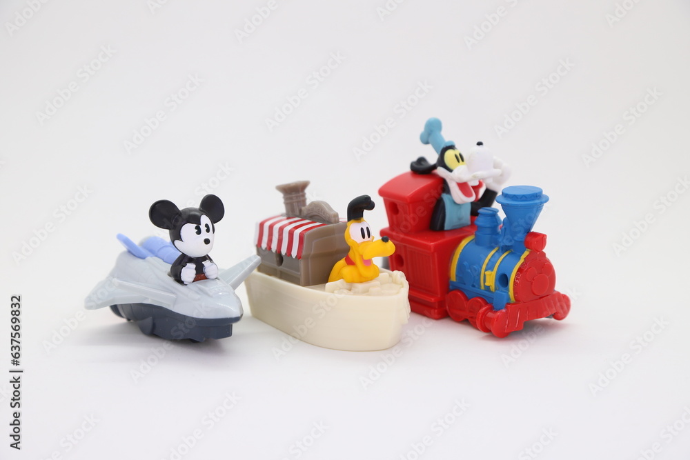 Pluto the dog sailing on a steamboat at the Disney World parks, Mickey ...