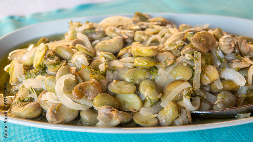 Traditional Turkish food; Fresh broad bean salad with olive oil, broad ...