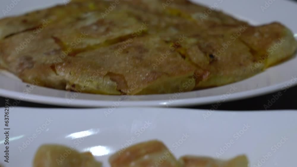 2 Roti topped with Chocolate sauce and sweetened condensed milk are ...