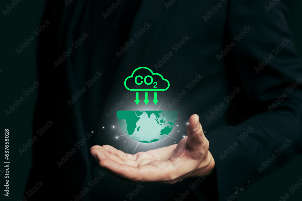 Reduce CO2 emission concept in the hand with icons, global warming for ...