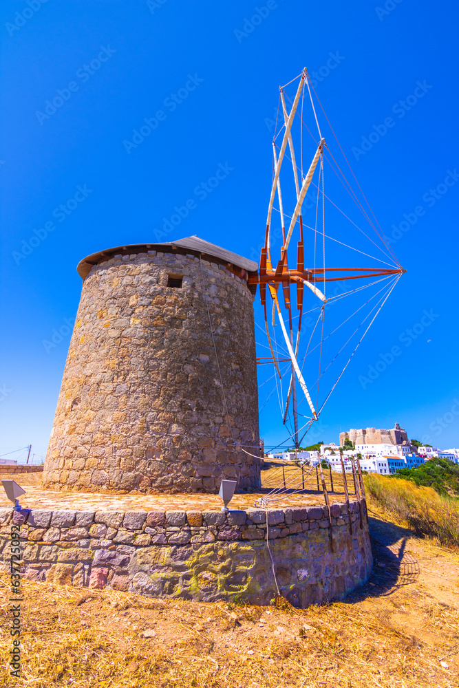 The three windmills of Chora and iconic Monastery of Saint John the ...
