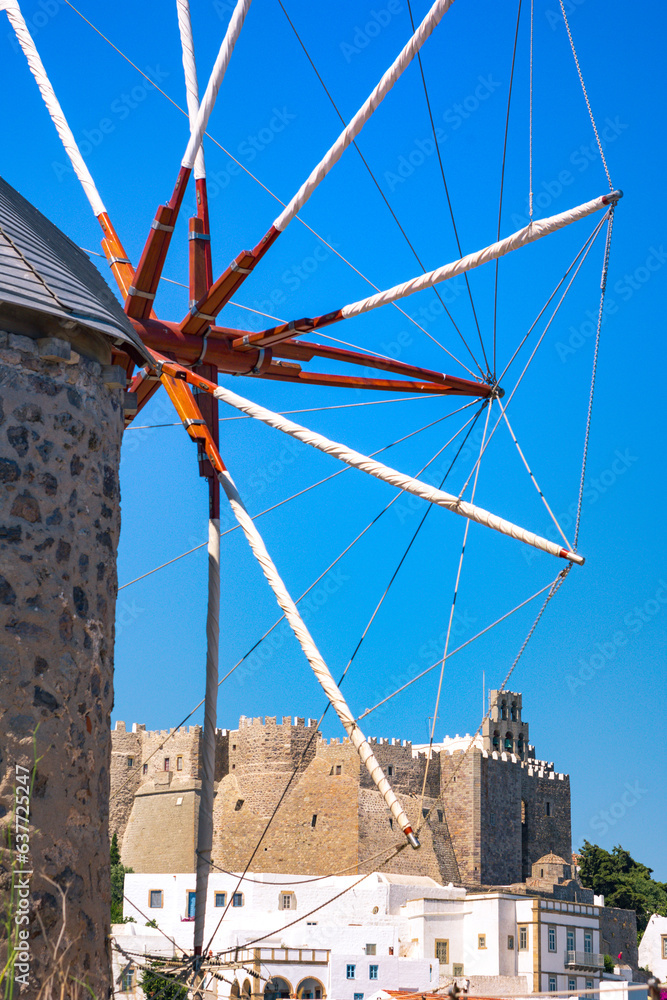 The three windmills of Chora and iconic Monastery of Saint John the ...