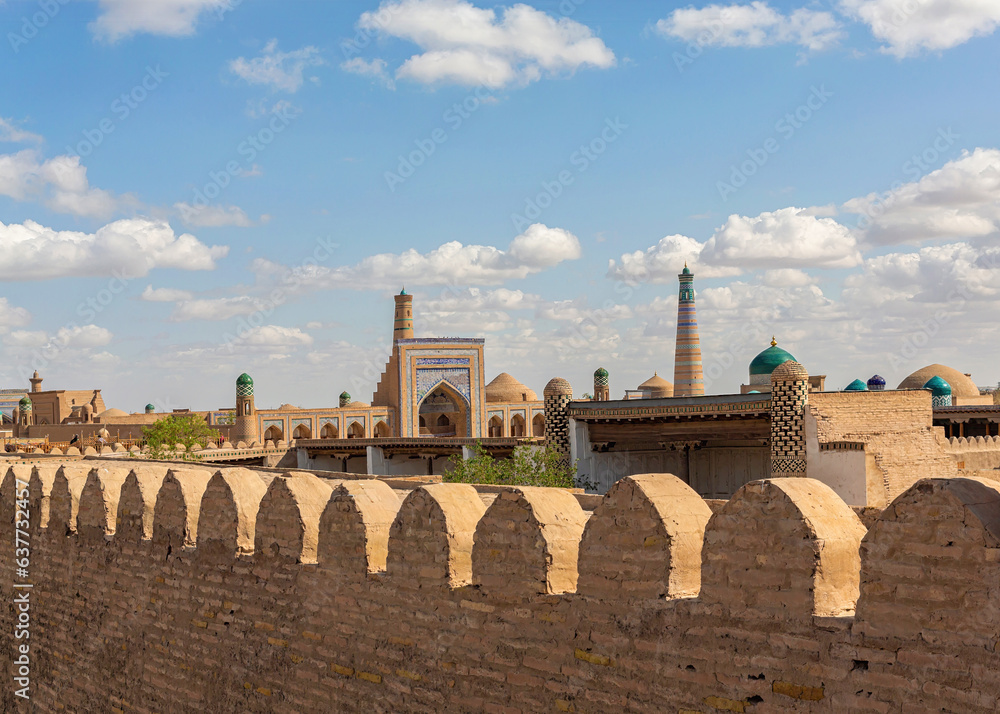 View on ancient Khiva (Xiva) from her defensive wall with clouds at ...