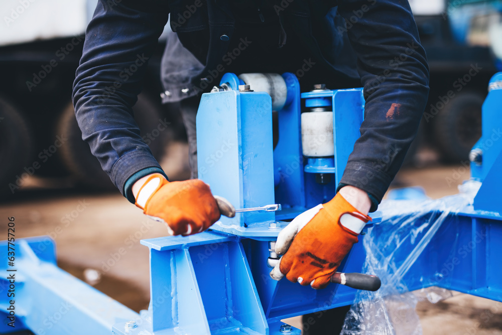 Manual worker working at shipyard construction site Stock Photo | Adobe ...
