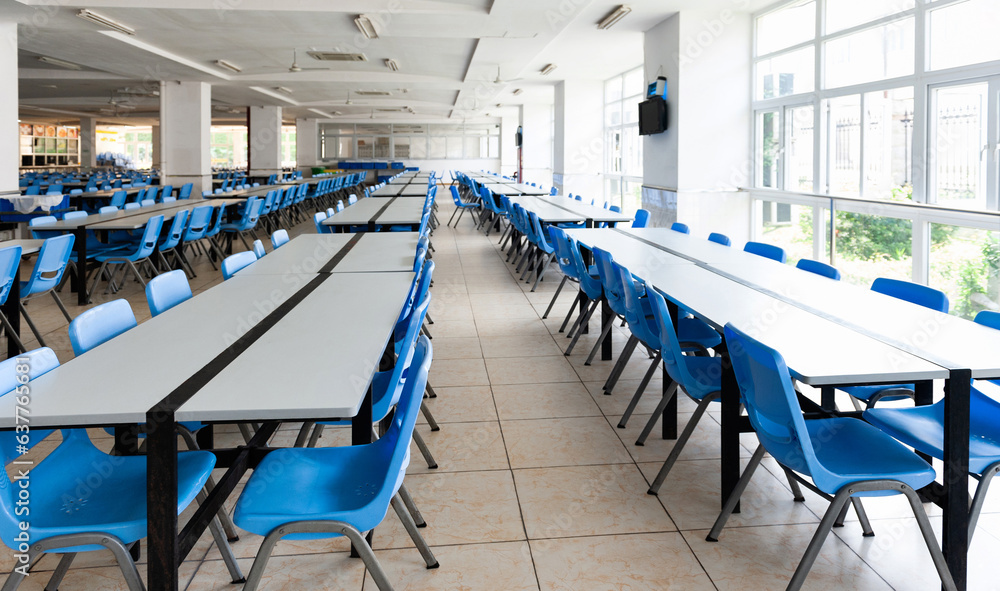 Clean school cafeteria with empty seats and tables Stock Photo | Adobe ...