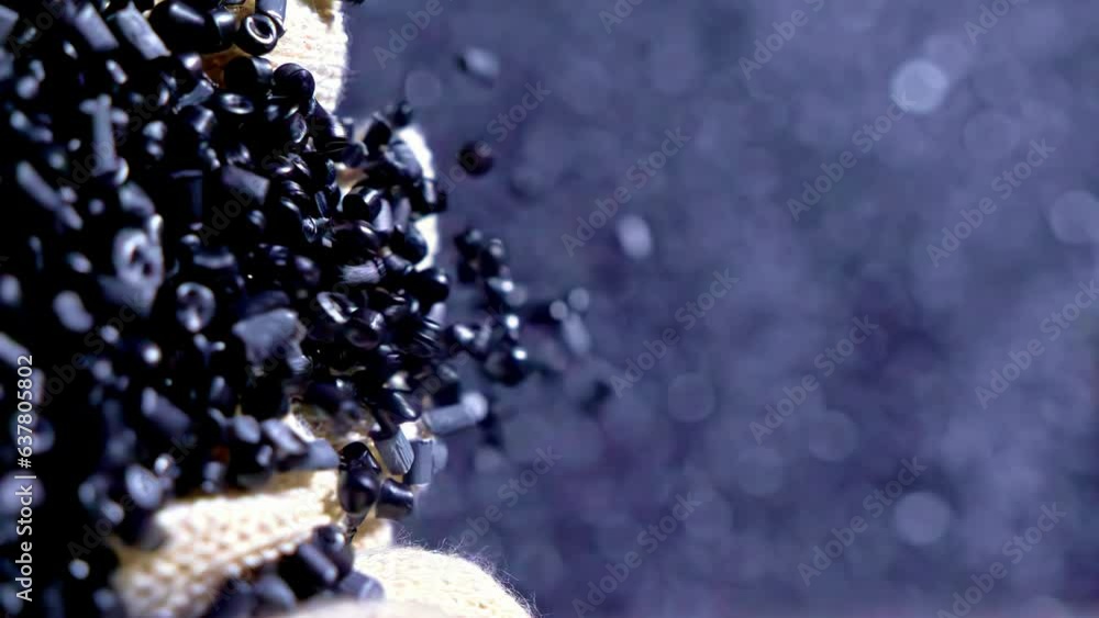 Concept ecological plastic recycling.4k slow motion pours plastic ...