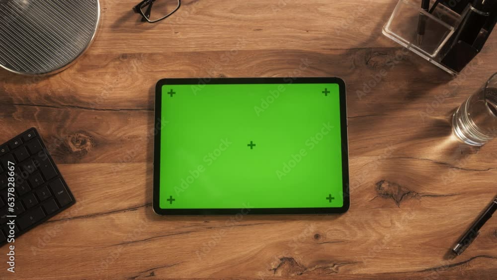 Top Down View of a Tablet Computer with Mock Up Green Screen Display ...