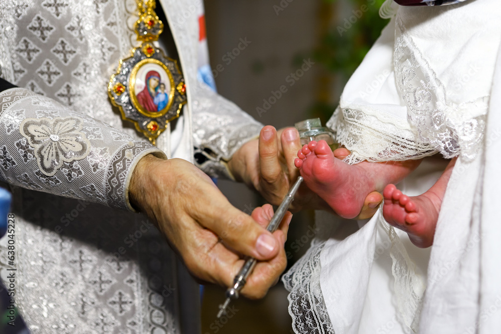 Baptism of a child. The rite of baptism of a child in the Orthodox ...