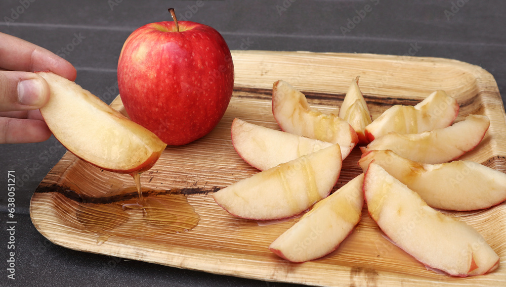 Foto de Rosh Hashanah concept stock photo. Apple dipped in honey ...