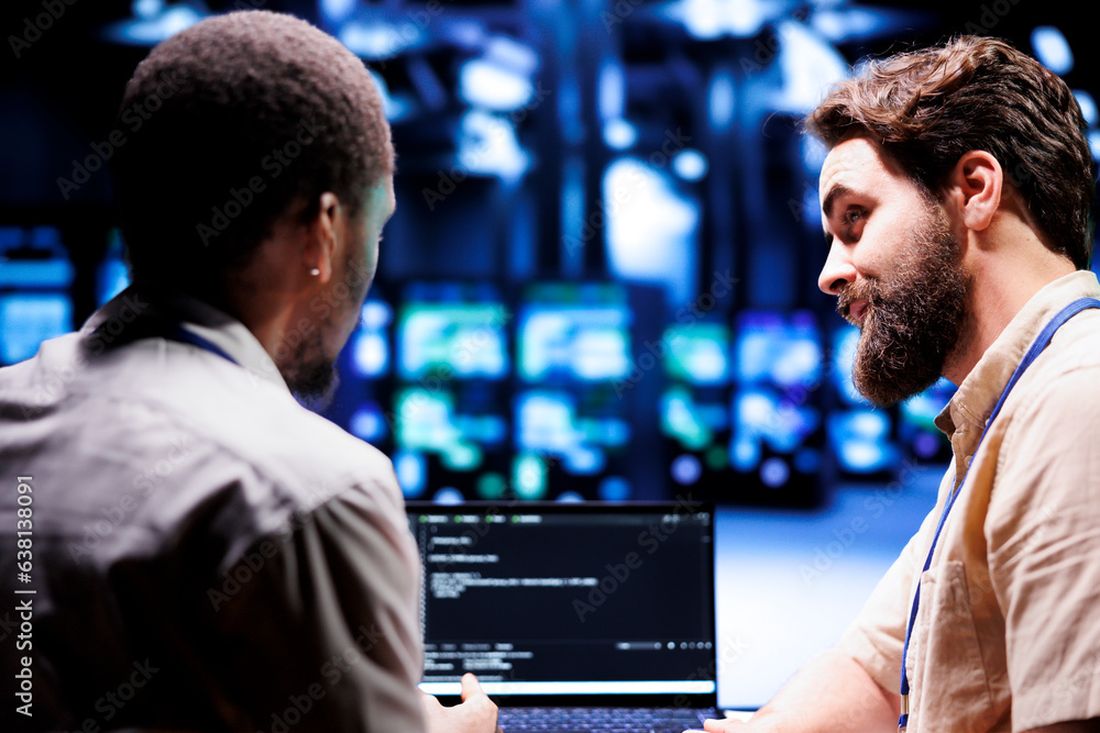 Coworkers Updating Blade Servers Writing Complex Binary Code Scripts