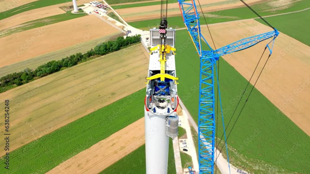 Construction Of Wind Turbine On Field. Crawler Crane Mounting Nacelle ...