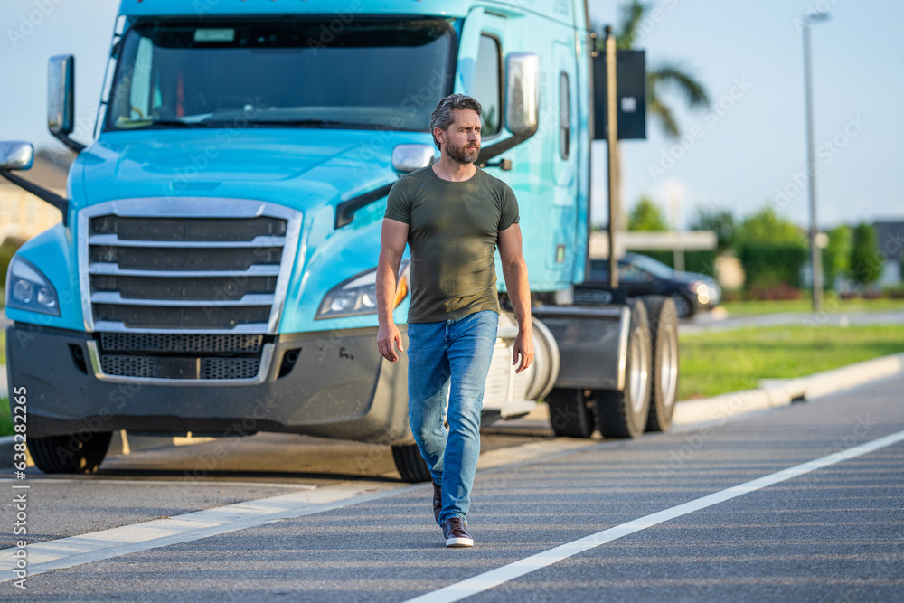 hispanic man posing in front of truck. Semi trucks vehicle. man driver ...