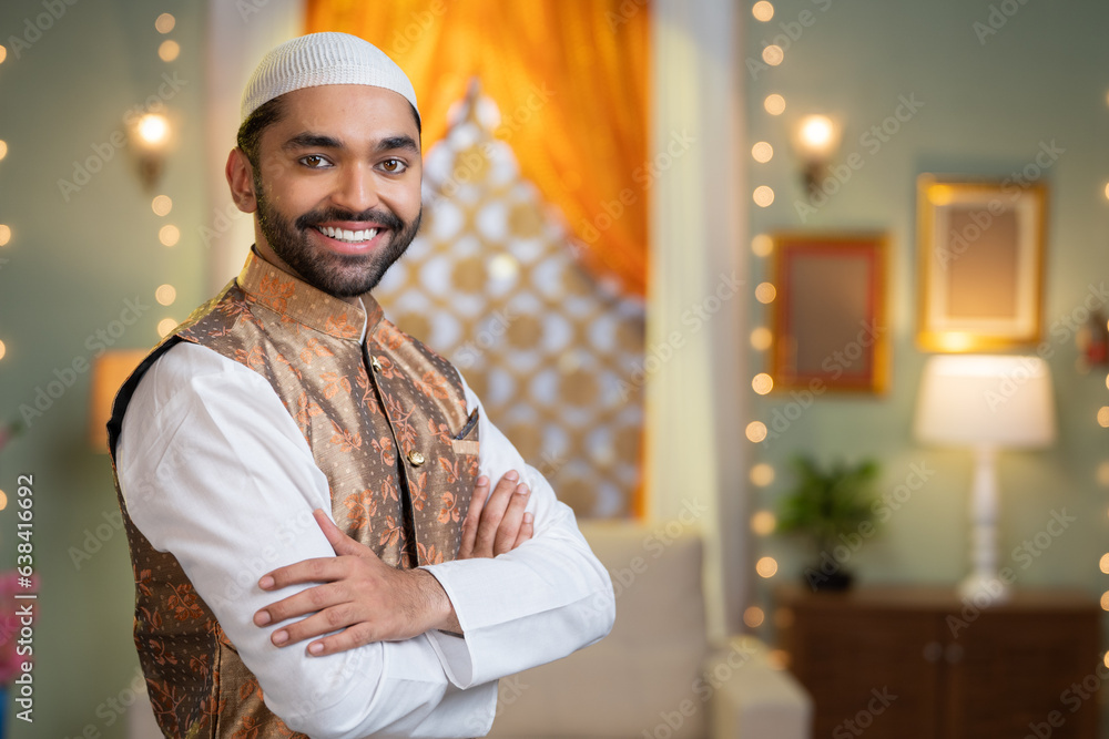 Happy smiling indian muslim man in traditional ethnic wear with crossed ...