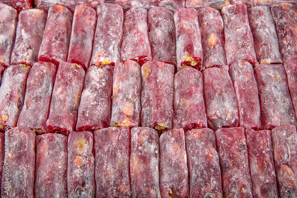 Sweet roll with pomegranate and nuts, turkish sweets. Mix of various ...