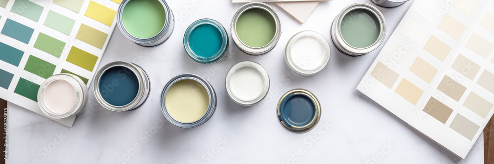 Tiny sample paint cans during house renovation, process of choosing ...
