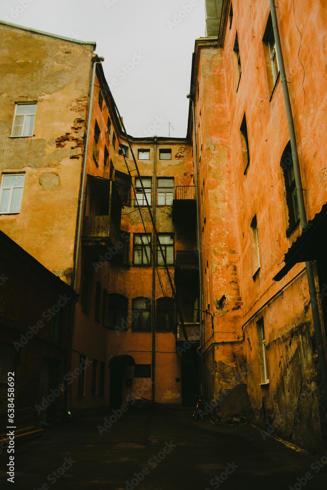 An empty courtyard of an old building on a gloomy day. The place ...