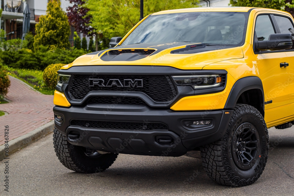 car on the road yellow 2023 Ram 1500 TRX Off-Road Performance Truck ...