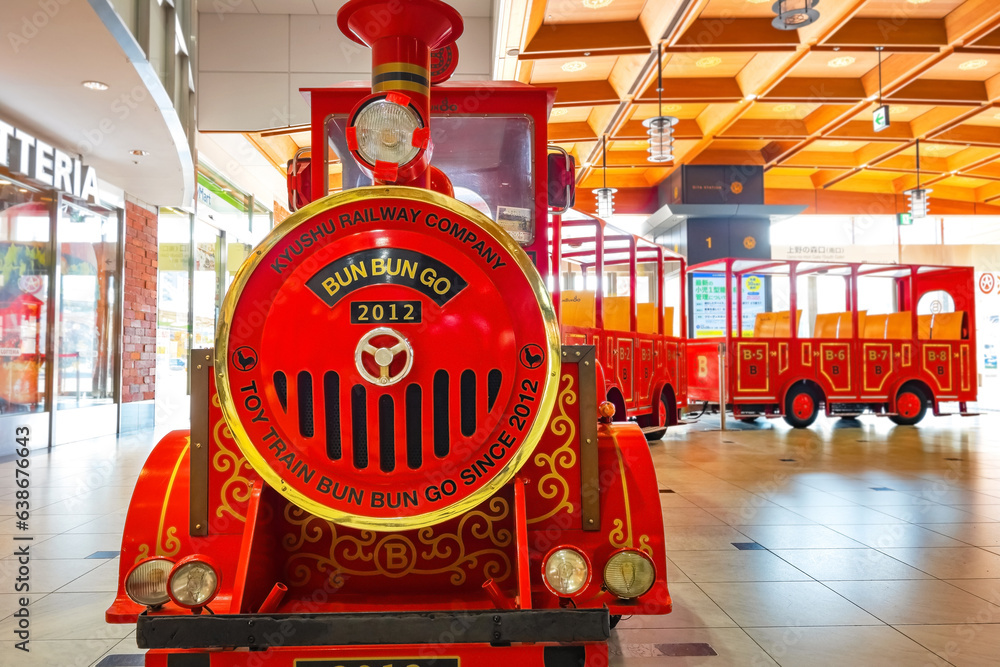Oita, Japan - Nov 26 2022:The famous Japanese toy train, Bun Bun Go, operated inside the central ...