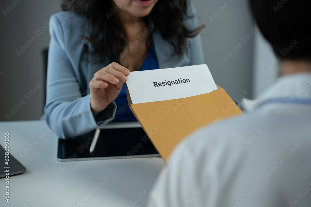 Office worker sends resignation letter to employer Regarding ...