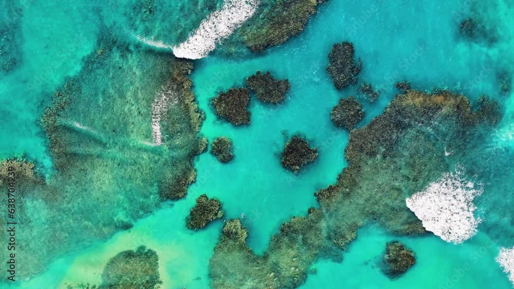 Turquoise shallow tropical Caribbean sea with reefs and small white ...
