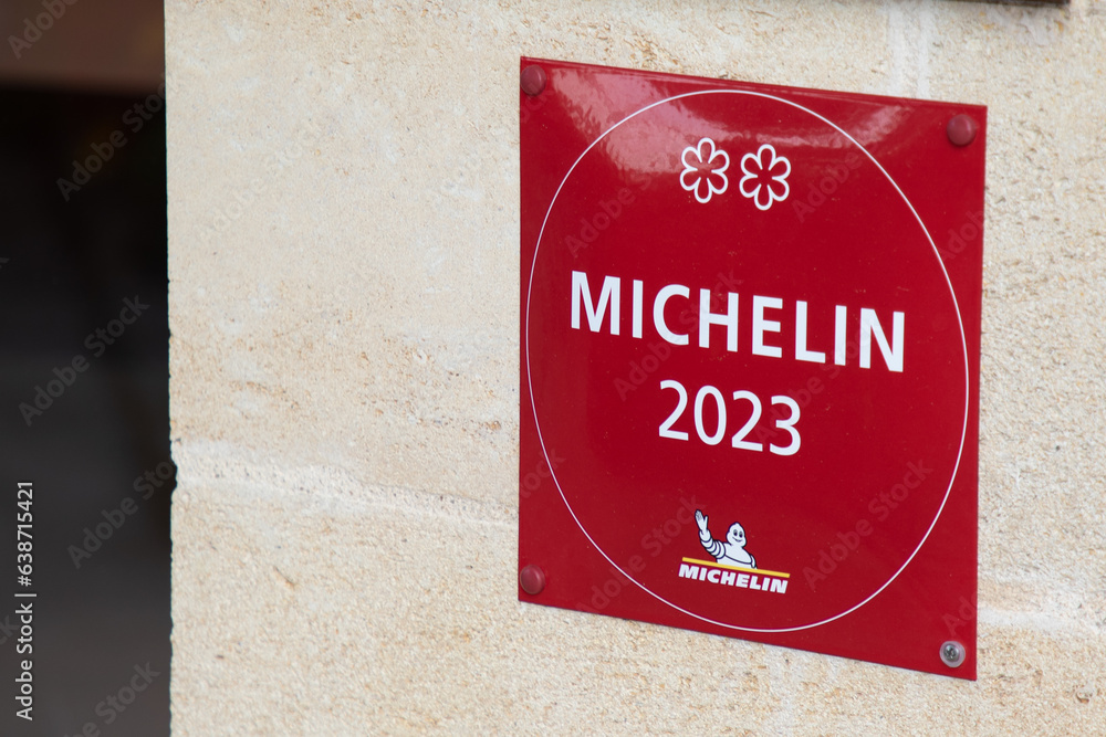 Michelin 2023 restaurant logo sign and text brand of guides books ...