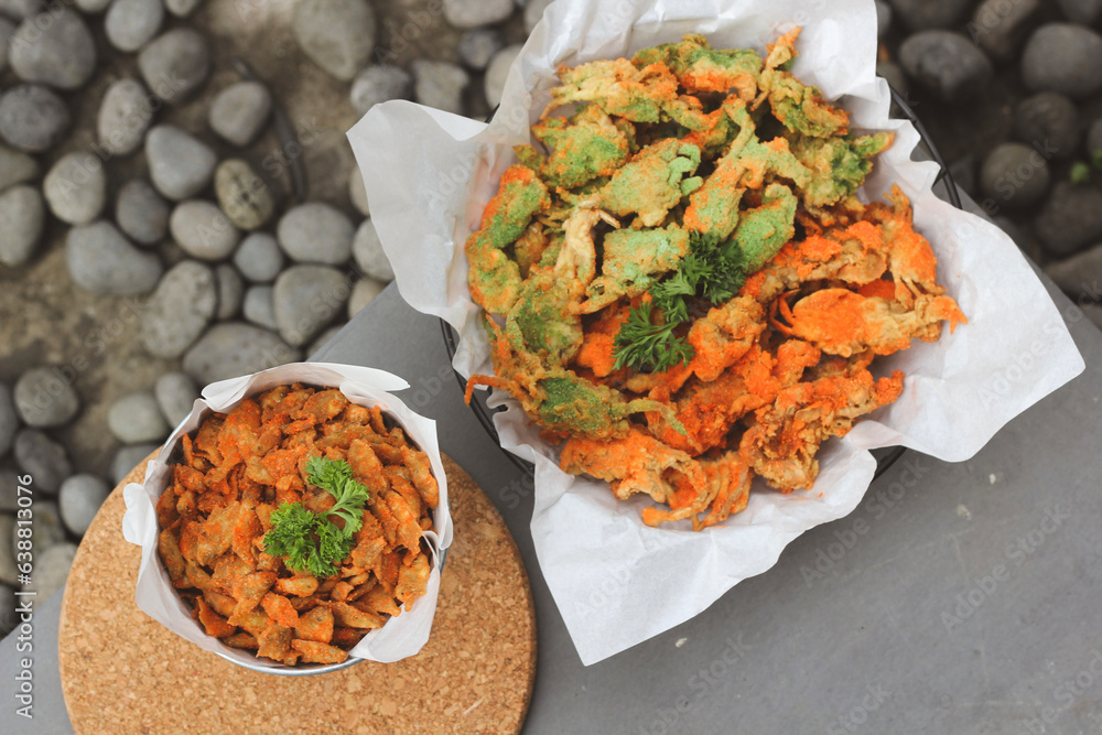 Crispy baby fish and crab with Indonesian balado flavor, topped with ...