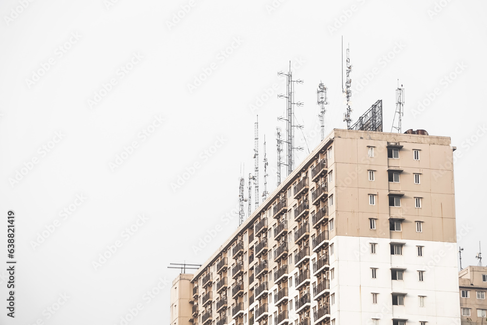 High-rise building with a lot of telecommunication internet provider ...